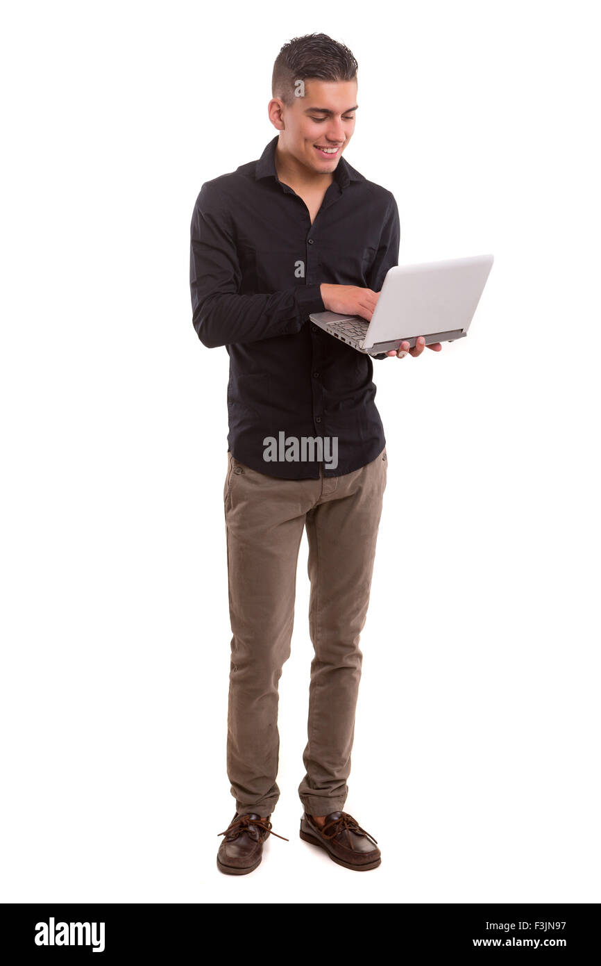 Young handsome man working with laptop computer Stock Photo - Alamy
