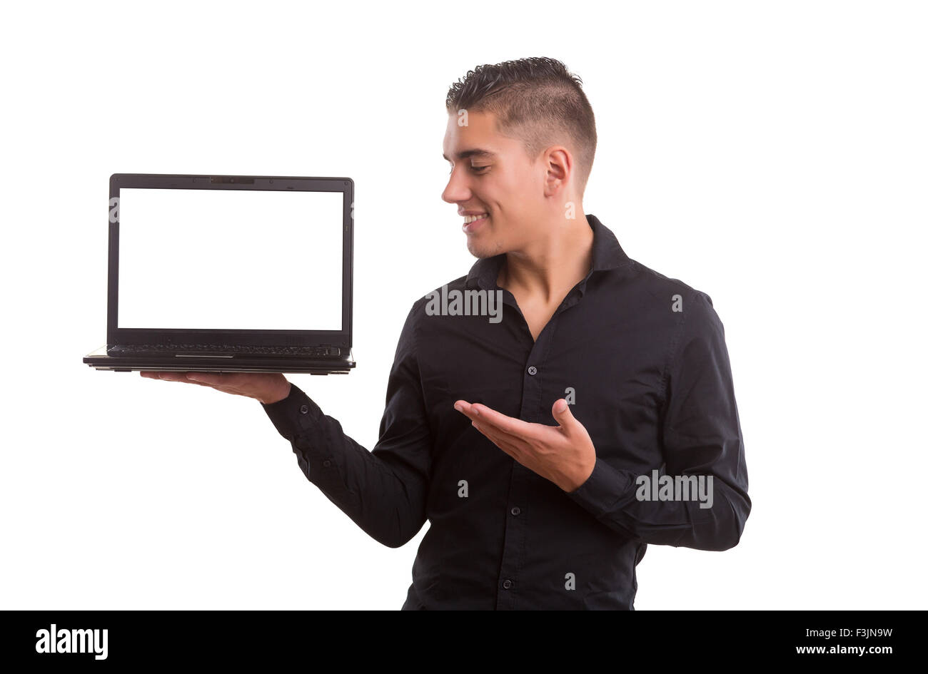 Young man presenting your product in a laptop computer Stock Photo - Alamy