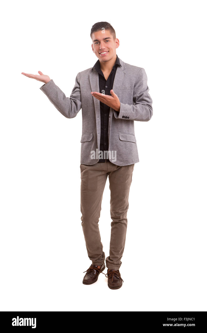 Young man presenting your product, isolated over a white background ...