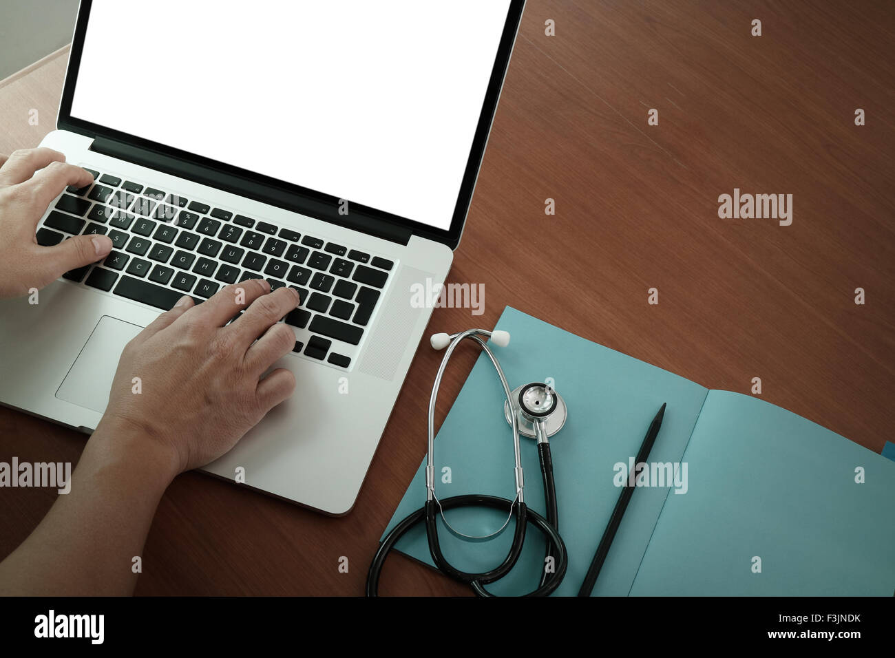 top view of Medicine doctor hand working with modern computer and smart ...