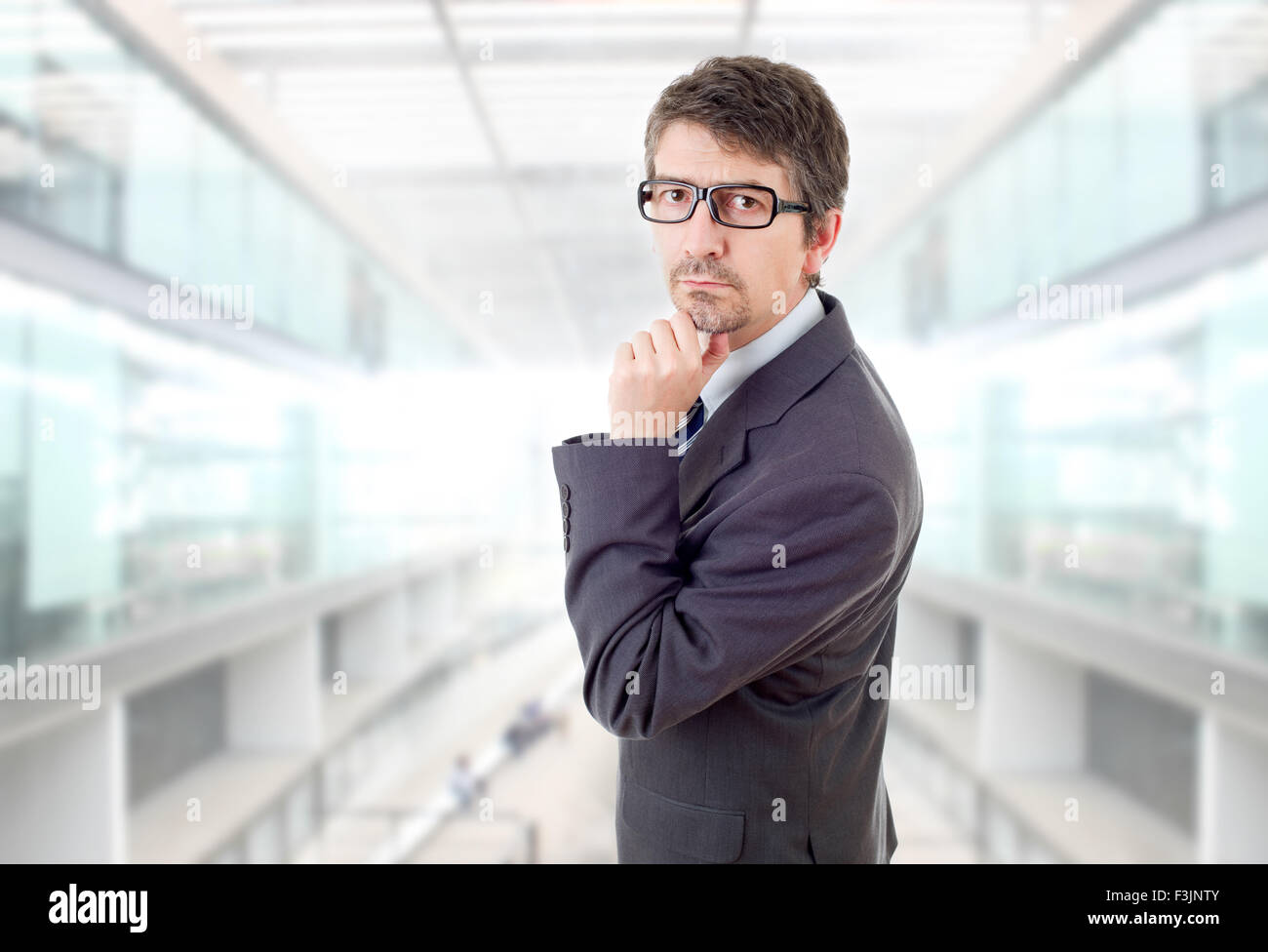 young business man thinking at the office Stock Photo - Alamy