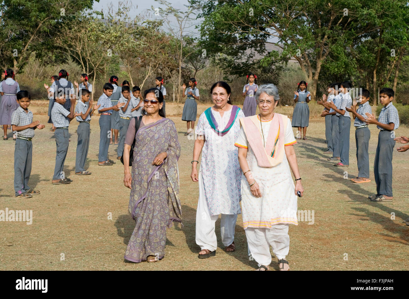 School girls welcoming guests at Shivkar village Panvel taluka ...