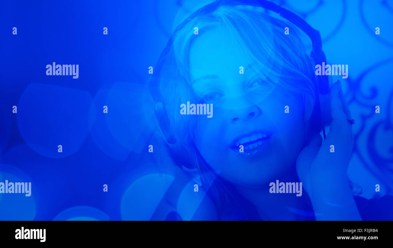 Girl blue music background Stock Photo - Alamy