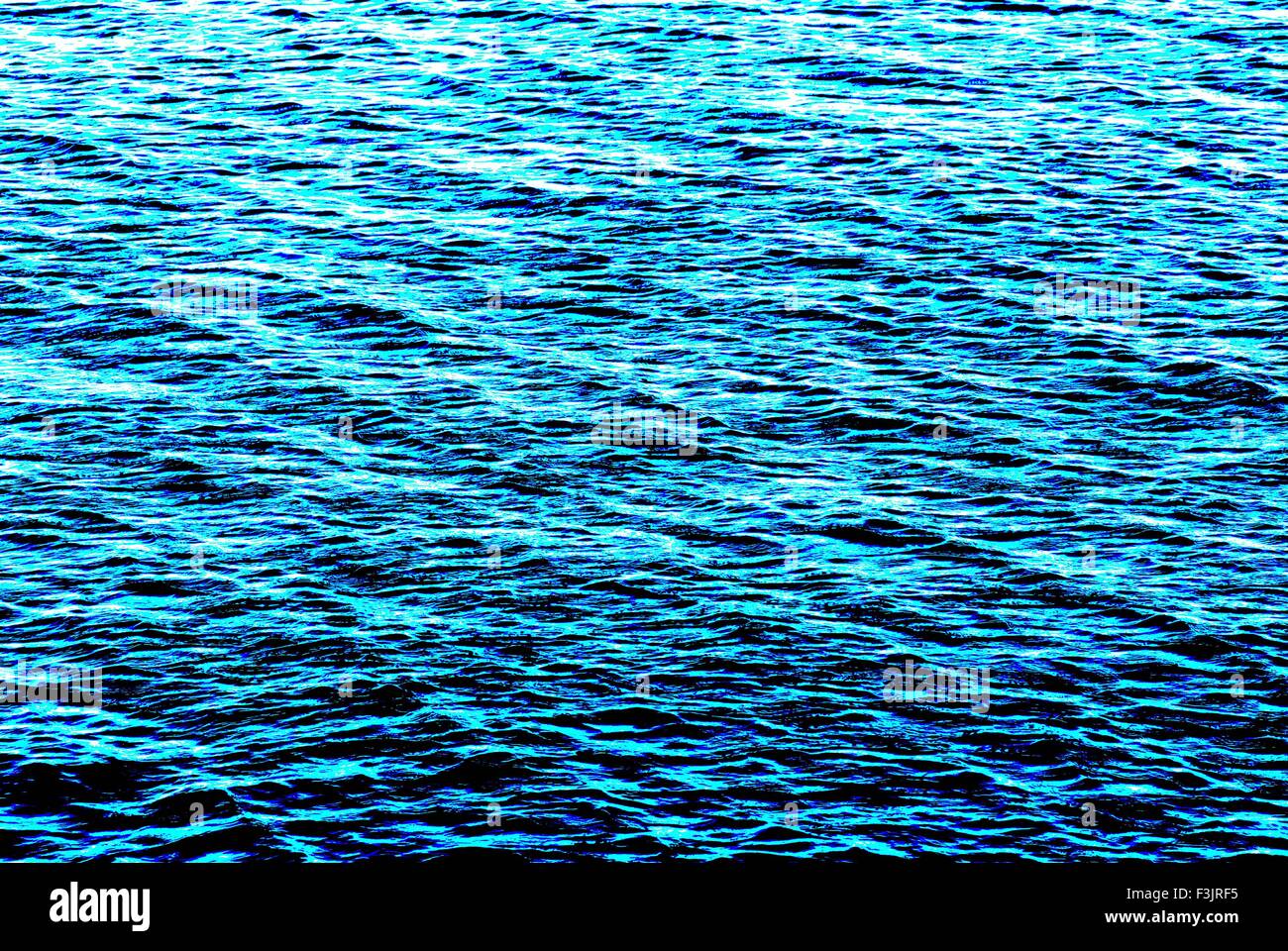 Blue water of Arabian sea with small waves at Harihareshwar Konkan ...