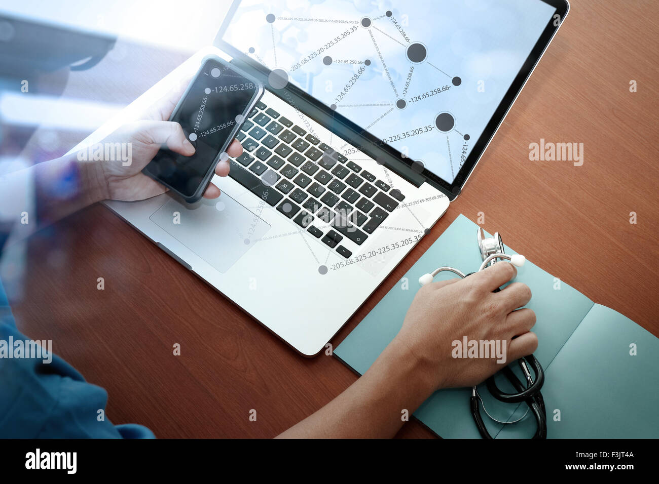 top view of Medicine doctor hand working with modern computer and smart ...