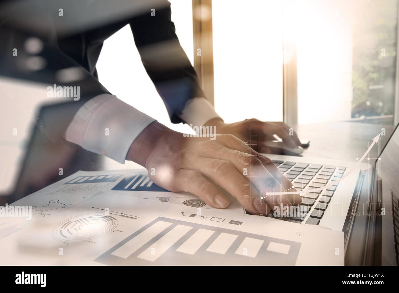 Double exposure of business man hand working on blank screen laptop ...