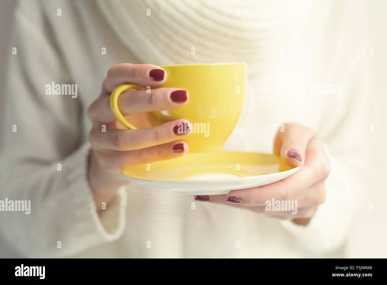 Female hands with cup Stock Photo - Alamy
