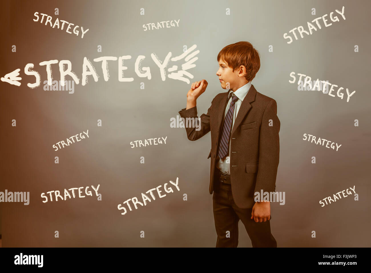 Teen boy businessman confidence and success strategy sign studio Stock ...