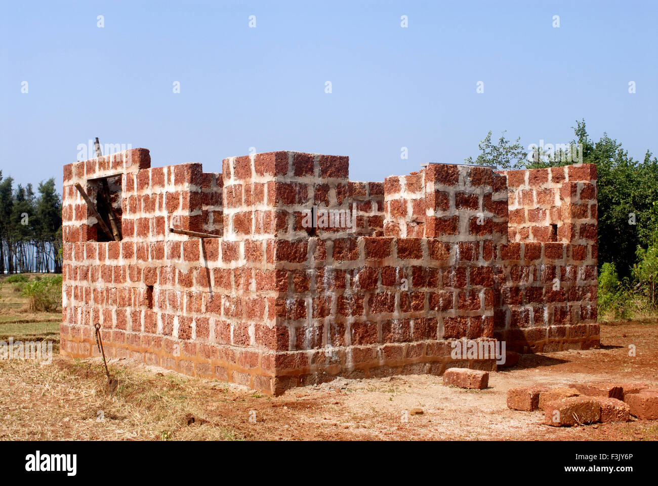 House under construction by using local red Jambha stone known as chira ...