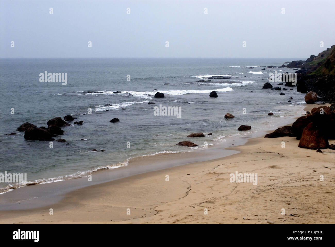 Rocks and sand at Kunkeshwar beach ; Arabian sea ; southern Konkan ...