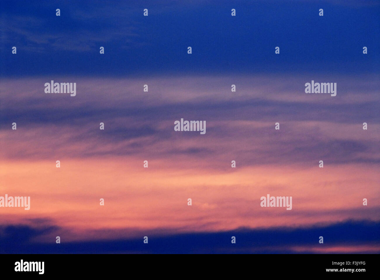 Colorful cloudy sky after sunset ; Kunkeshwar beach ; Konkan coast ...