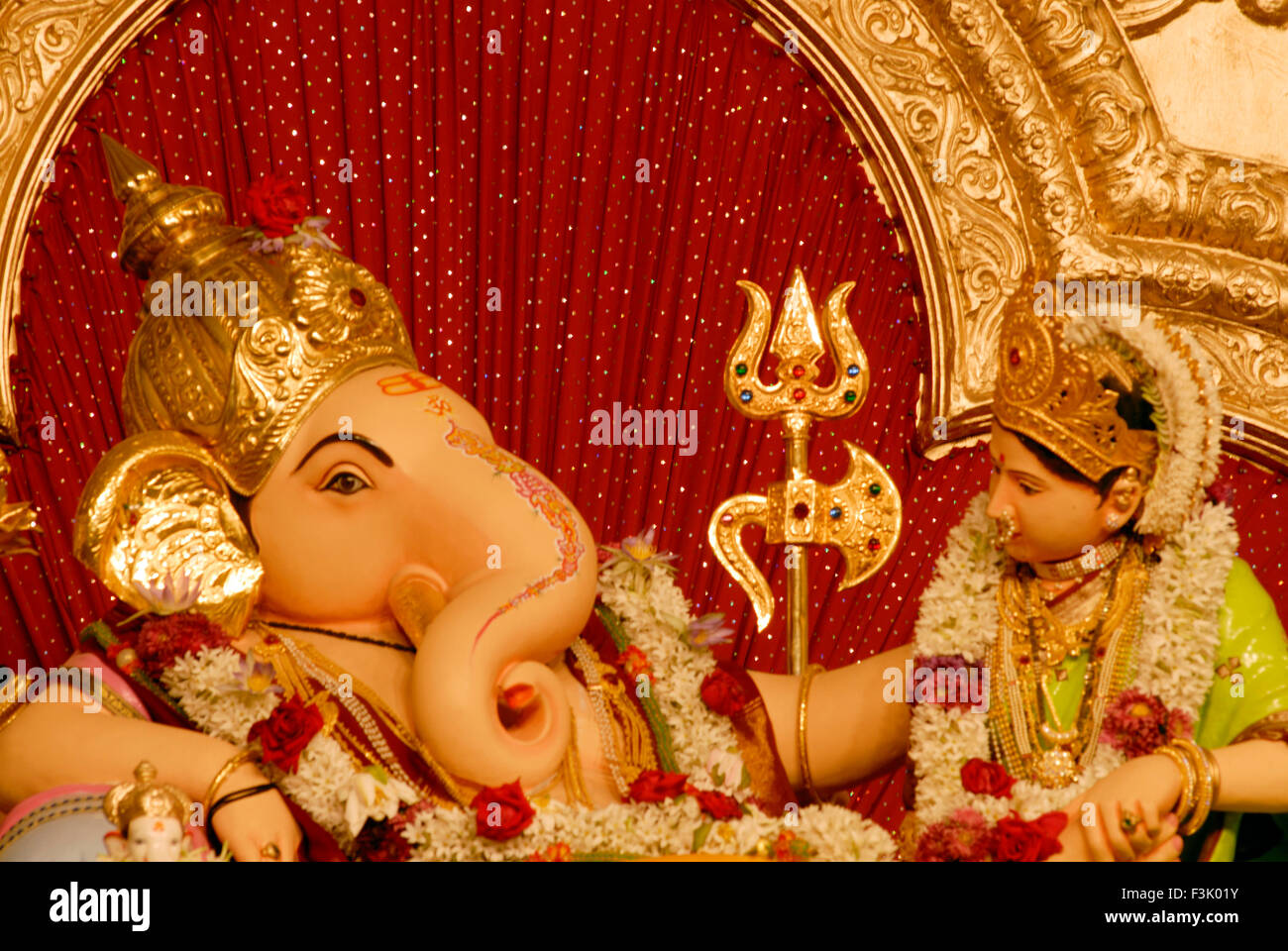 Idol of Lord Ganesh Goddess Laxmi sitting pose magnificent decoration ...