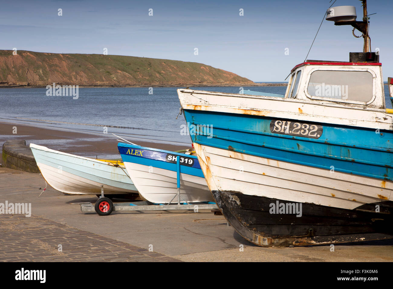UK, England, Yorkshire East Riding, Filey, fishing boats high and dry ...