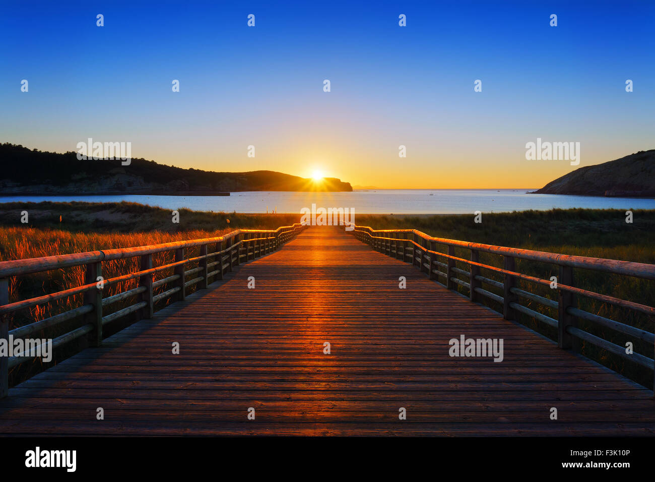 Wooden path sunset beach hi-res stock photography and images - Alamy