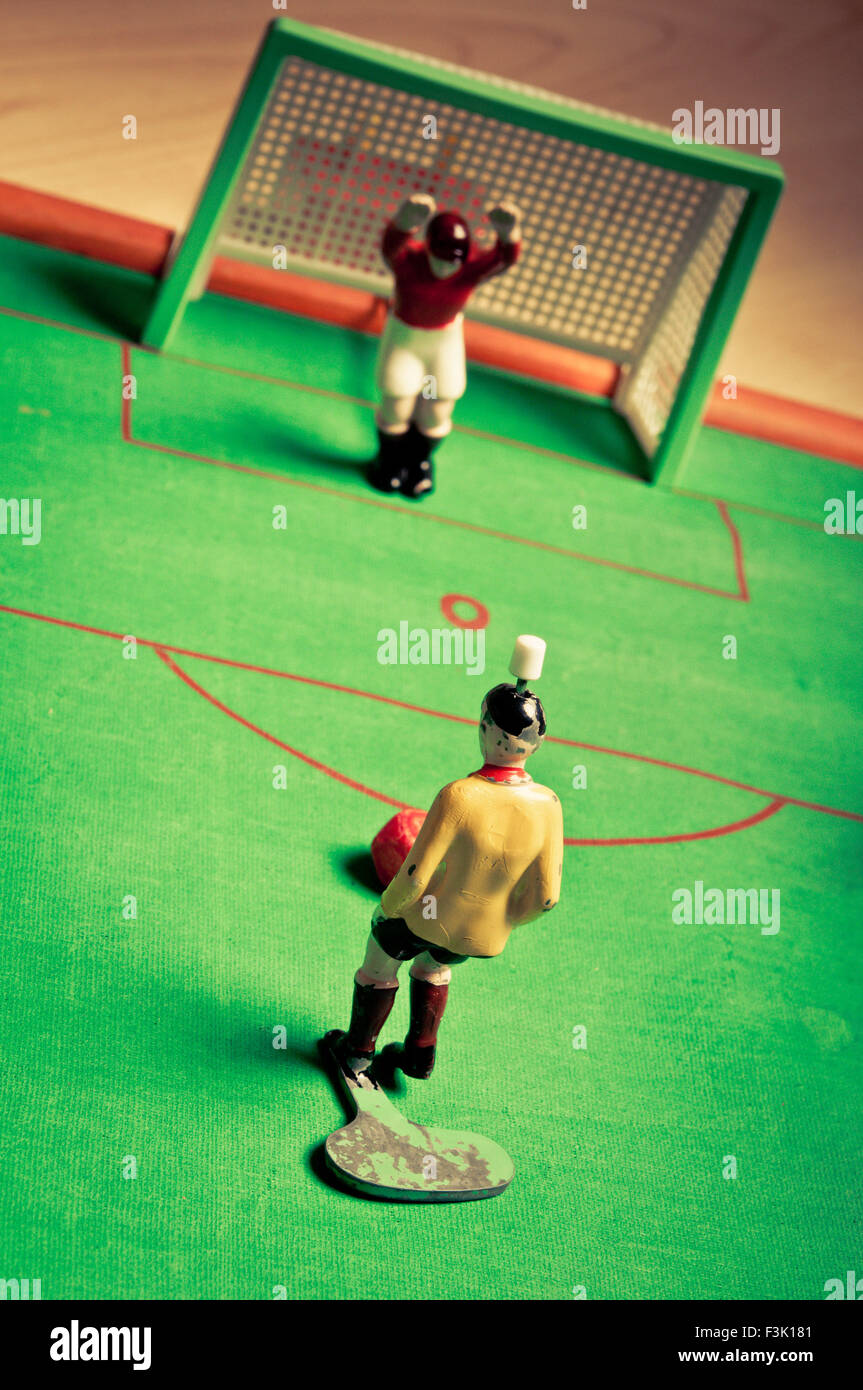 tip kick vintage game of football Stock Photo - Alamy