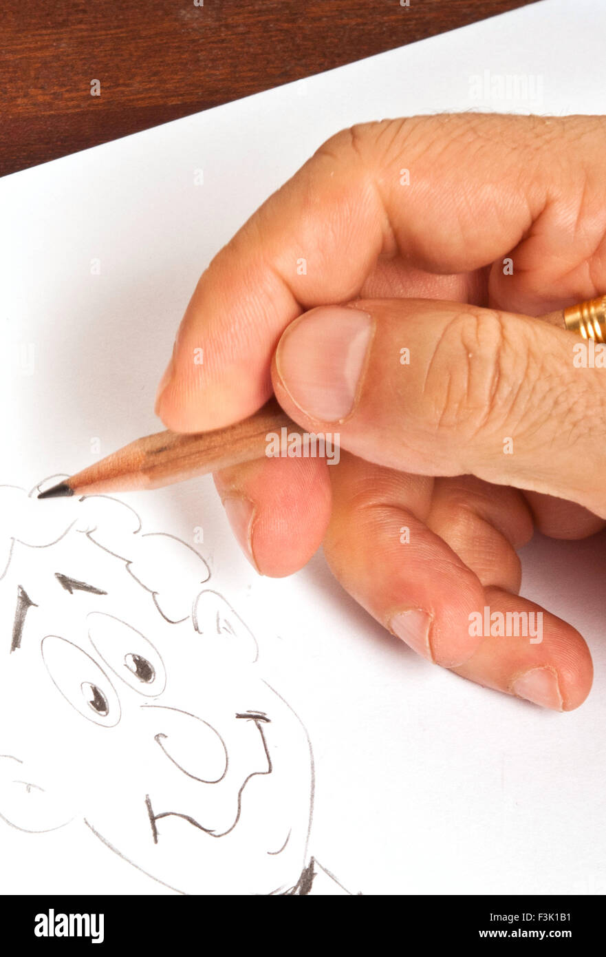 Male hand drawing cartoon figure hi-res stock photography and images ...