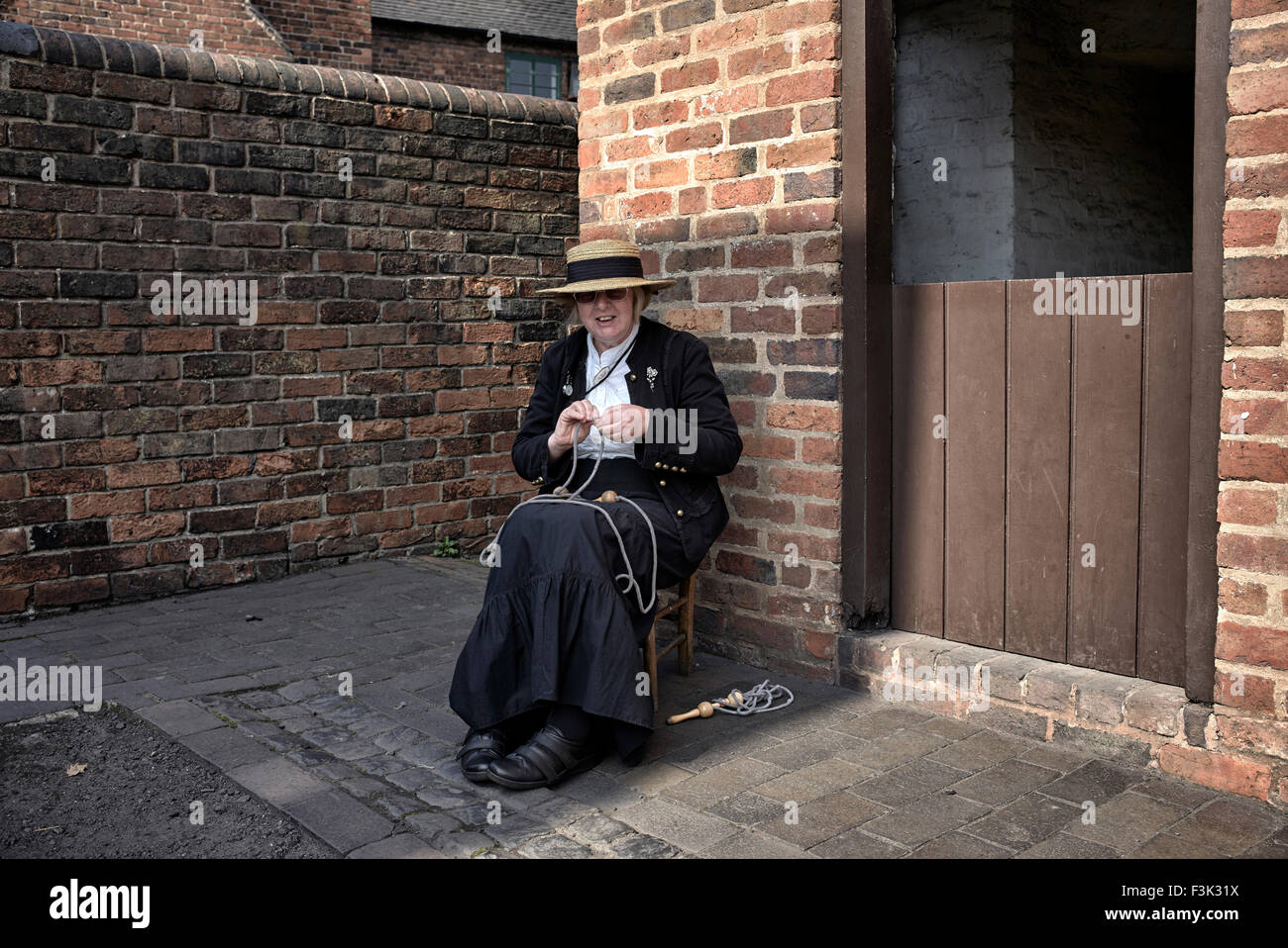 Traditionally Attired Woman In 1900s Period Costume At The Black Stock