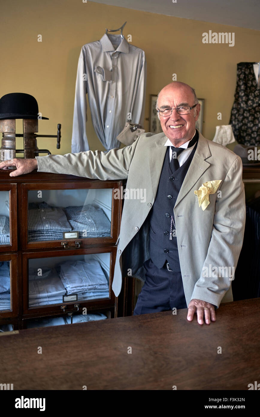 1900s shopkeeper. Mens outfitter in traditional period attire. Black ...