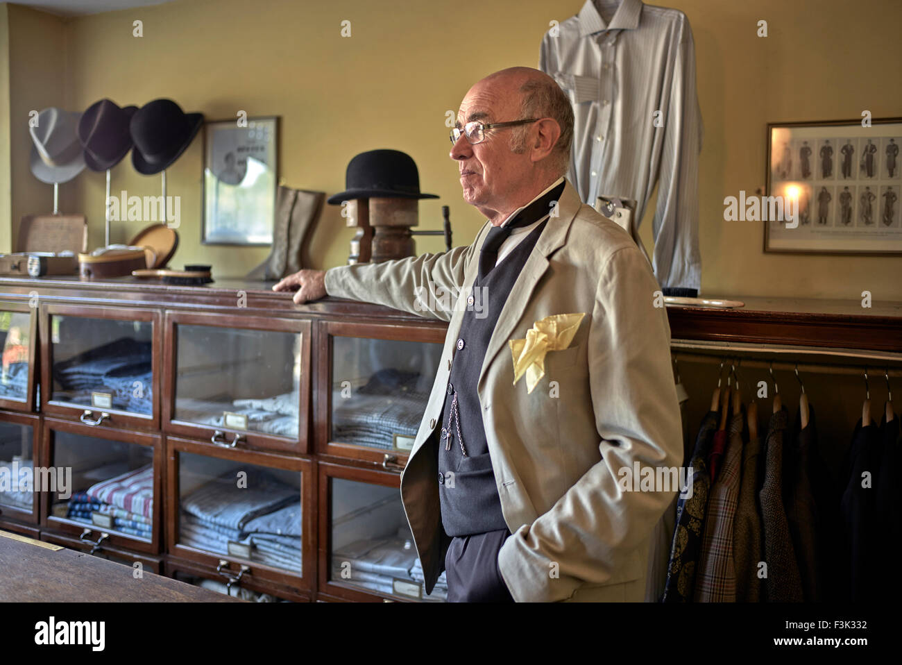 1900s shopkeeper. Mens outfitter in traditional period attire. Black ...