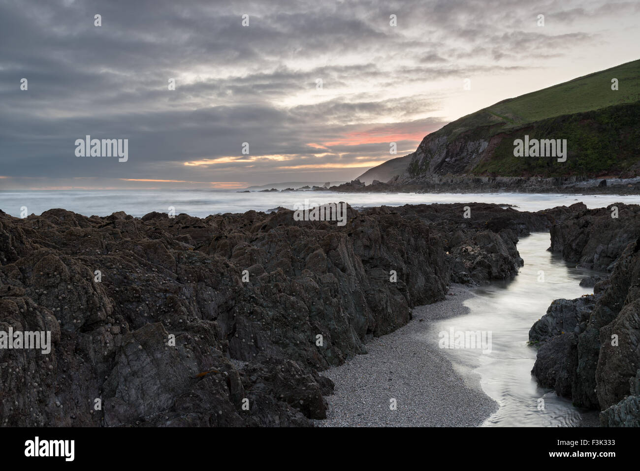 A stormy night on the beach at Portwrinkle of the south coast of ...