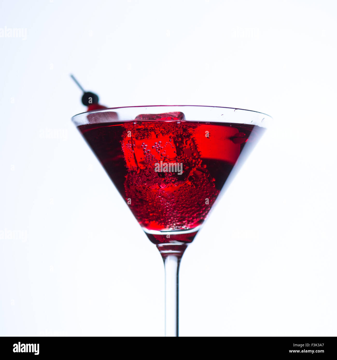 Fire blowing out of martini glass/close-up with white background Stock ...