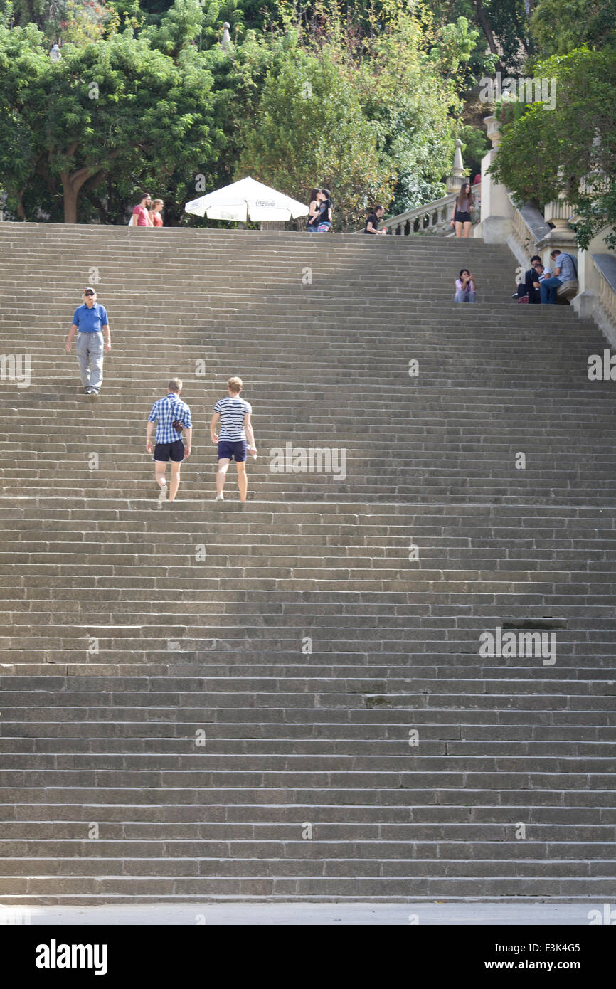 Tourists walking up the very steep stone Steps leading to the Magic ...