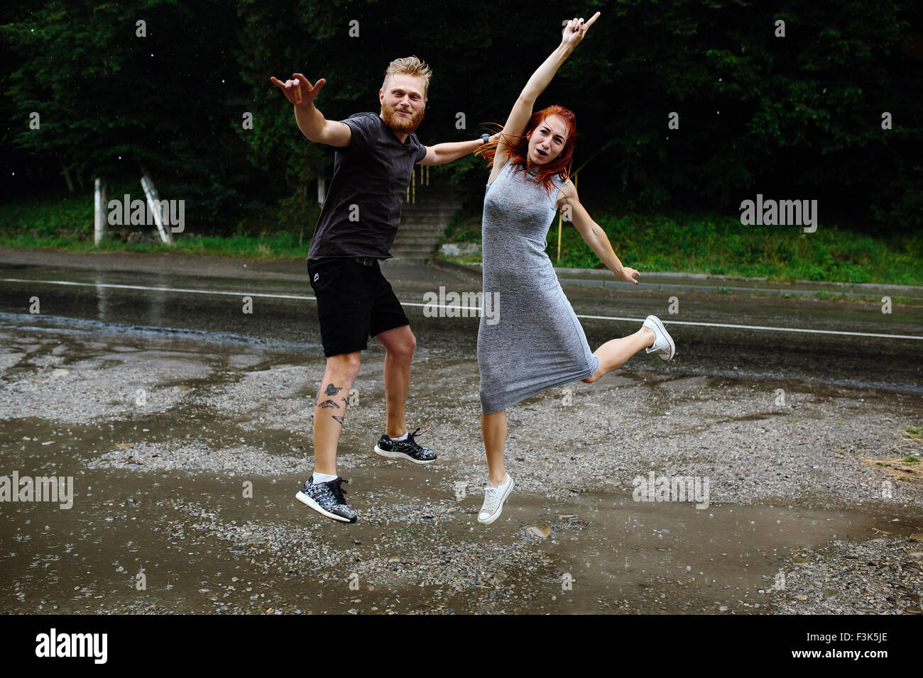 beautiful couple in the rain Stock Photo - Alamy