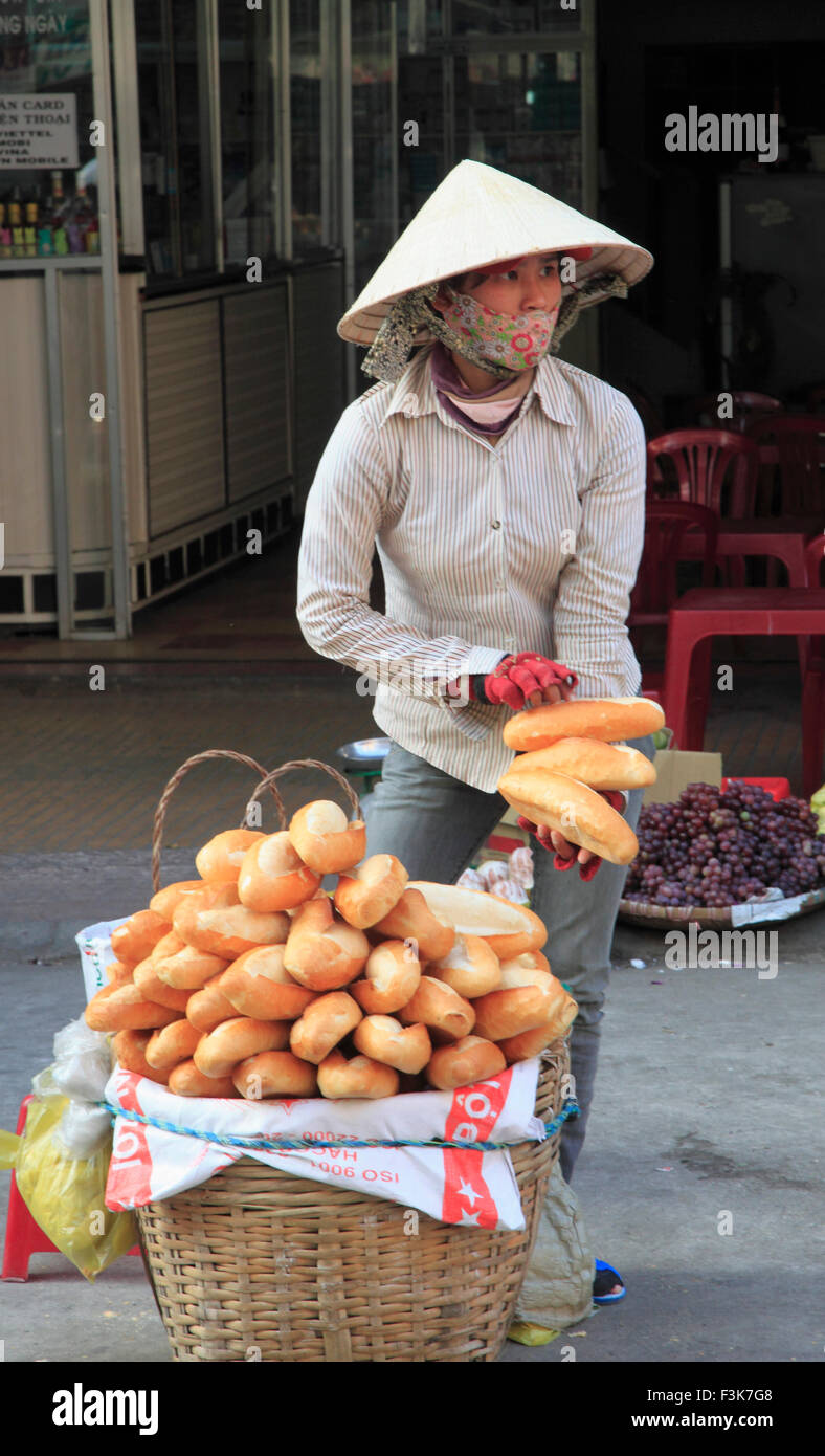 Vietnam, Dalat, market, french bread vendor Stock Photo - Alamy