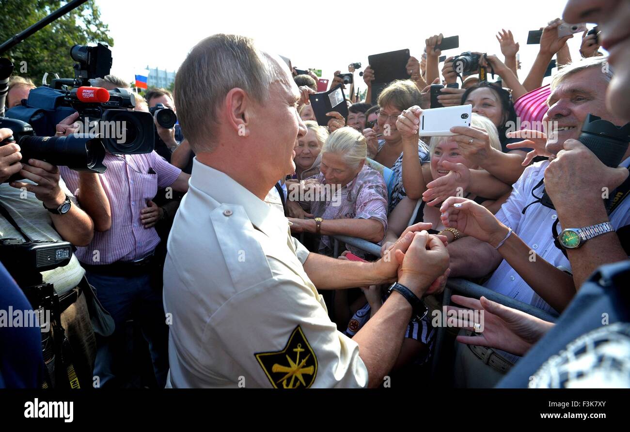 Russian President Vladimir Putin greets supporters during a visit to ...