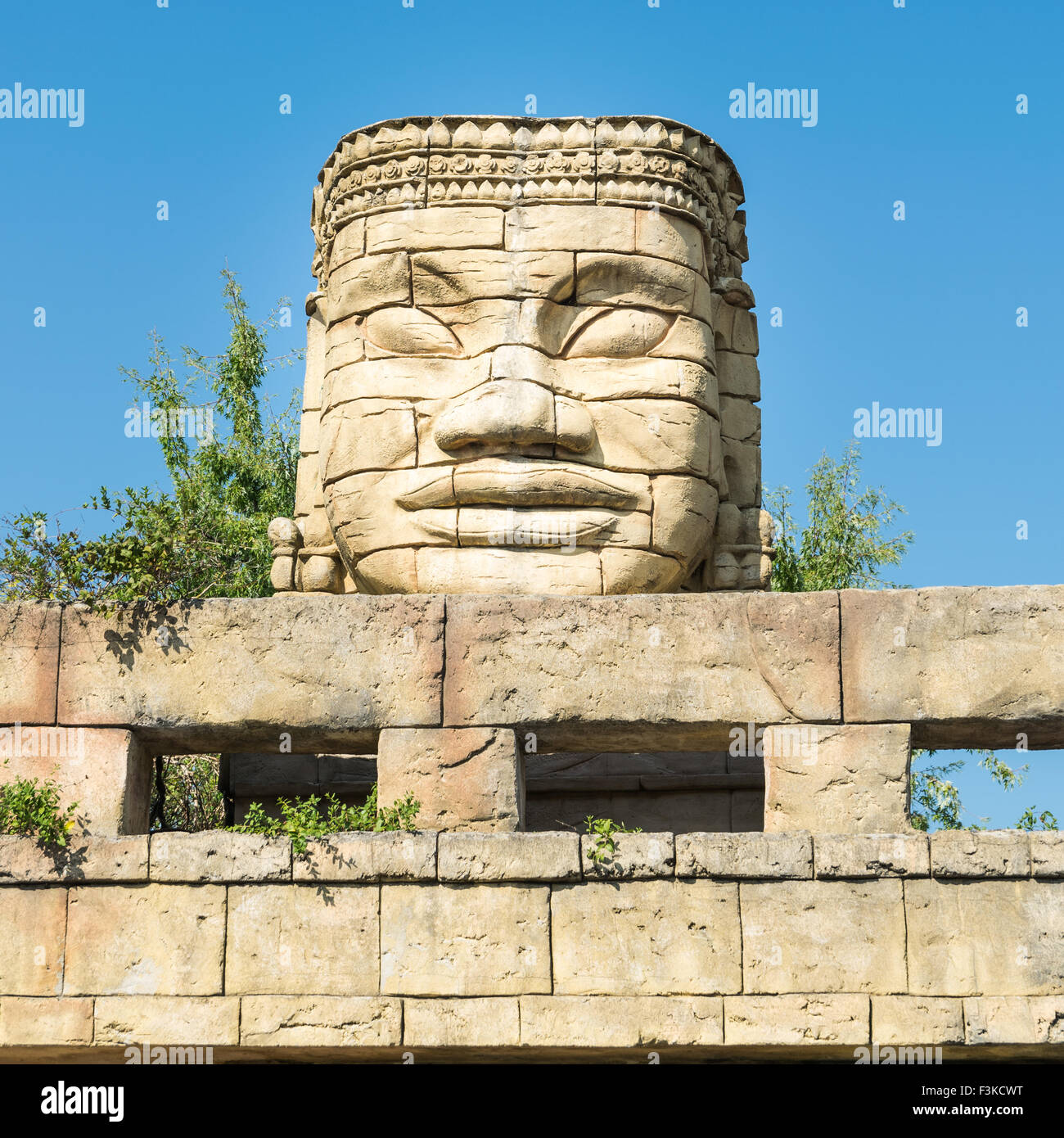 Stone face of a temple in the forest Stock Photo - Alamy