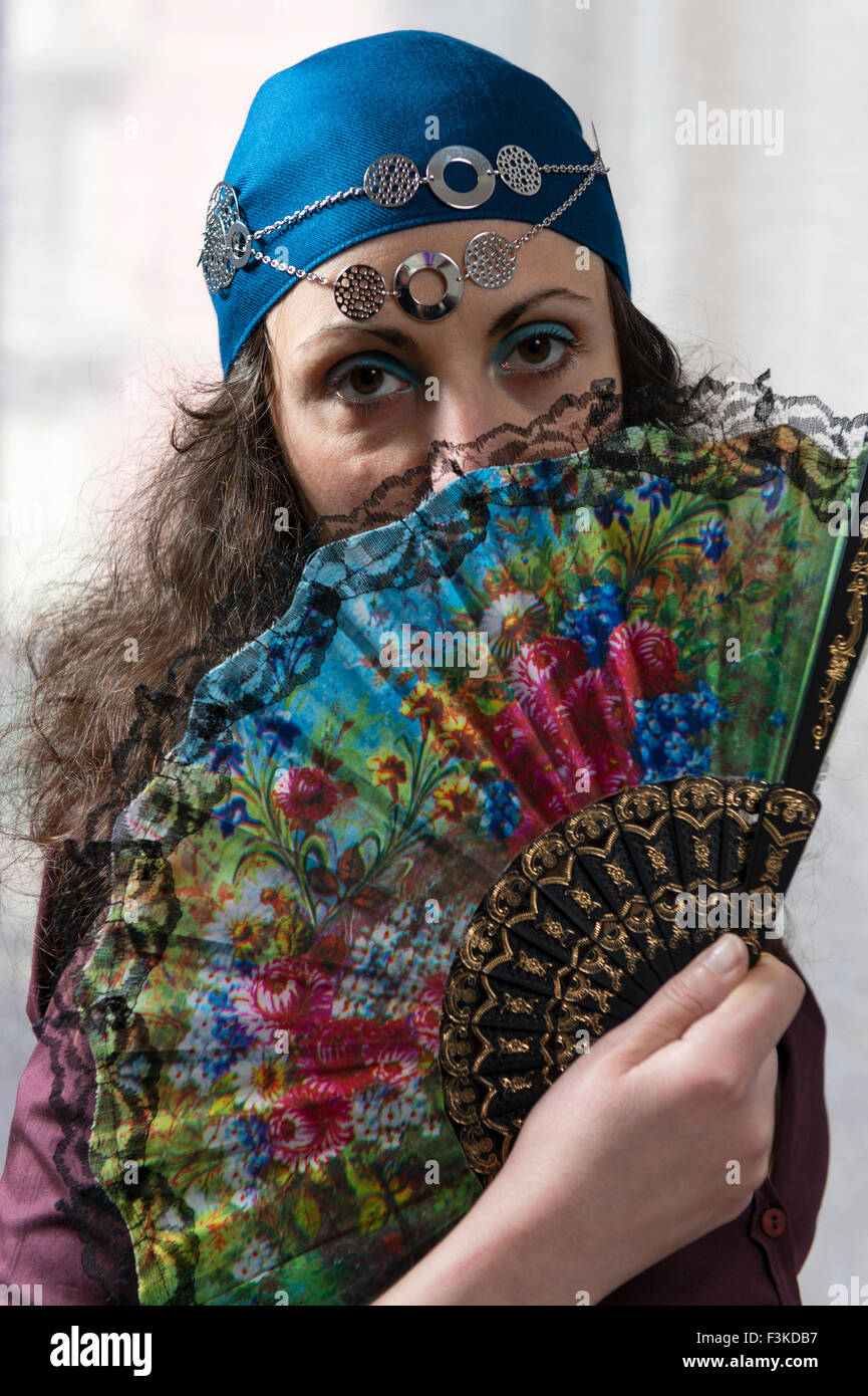 Hiding Behind Fan High Resolution Stock Photography and Images - Alamy