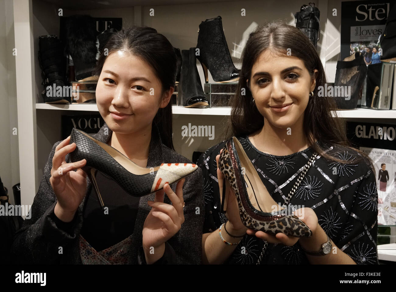 London,UK, 8th Oct 2015 : Lucy Choi shoes addiction fans holding up one ...