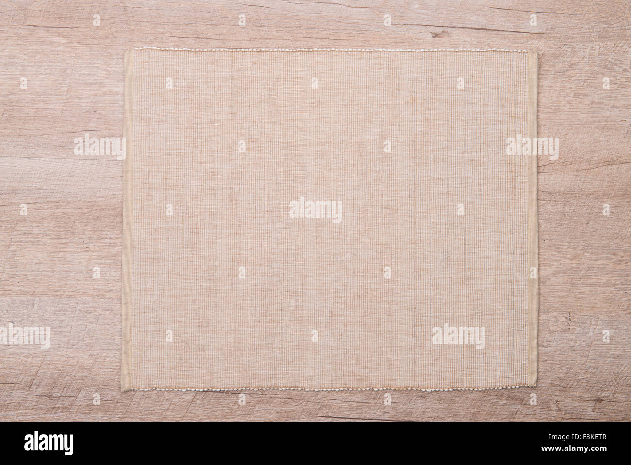 Place mat on wooden deck table Stock Photo - Alamy
