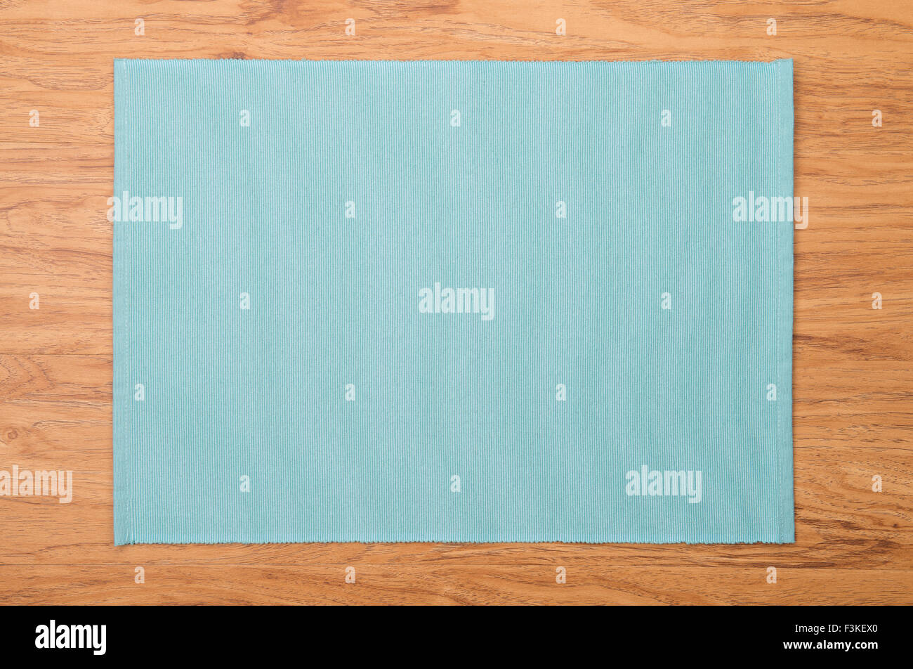 Place mat on wooden deck table Stock Photo - Alamy