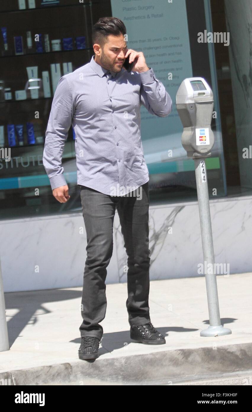 'Shahs of Sunset' star Mike Shouhed chats on his mobile phone while out ...