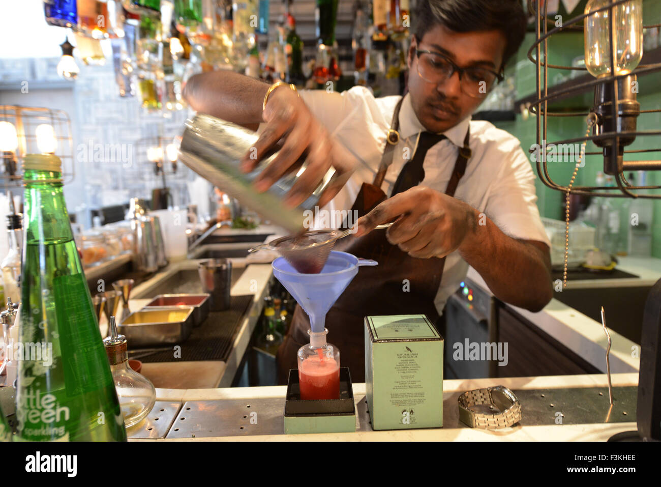 Mixing up cocktails at the Tippling Club cocktail bar in Singapore ...