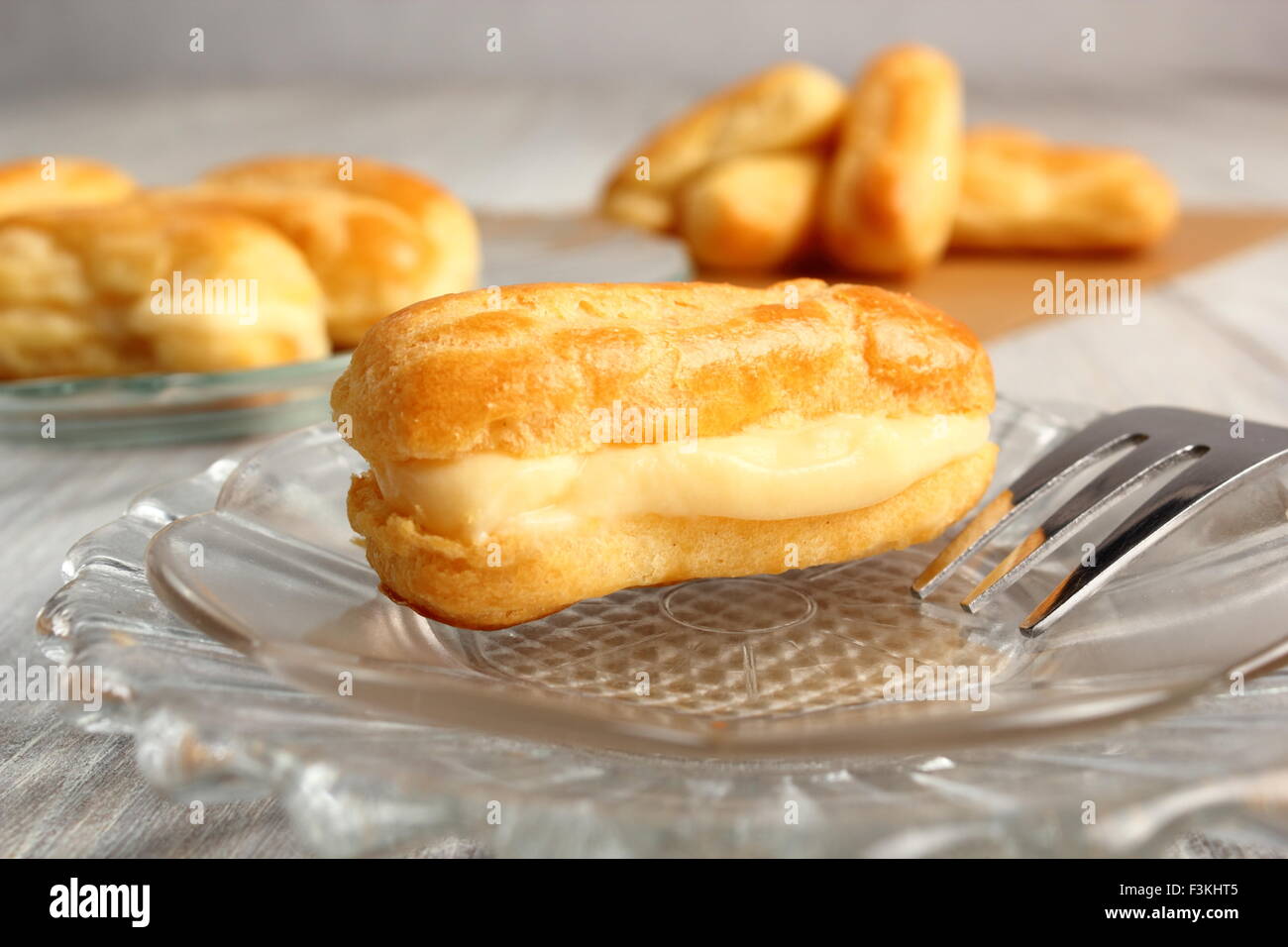 Eclair with cream Stock Photo - Alamy