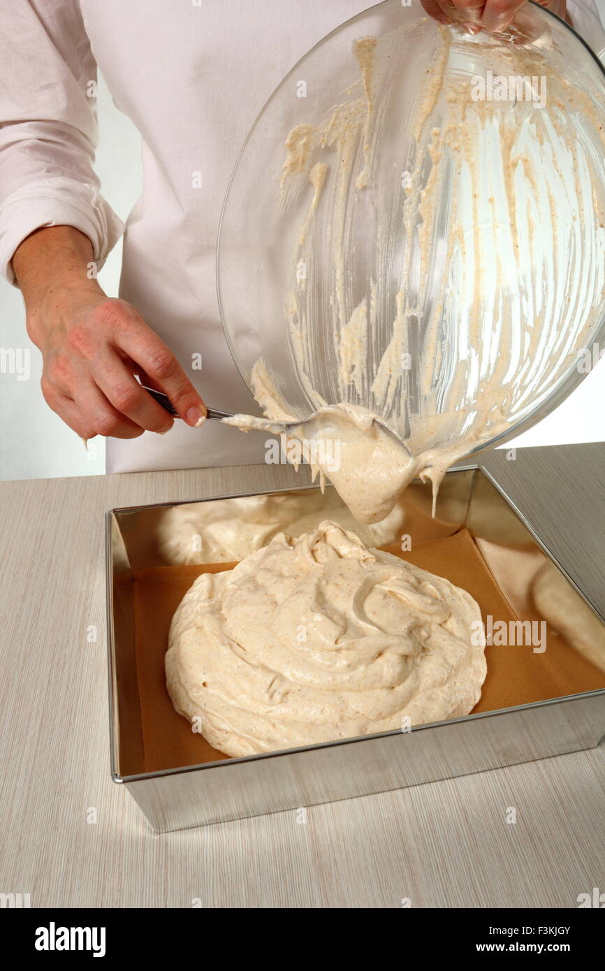 Spoon mixture into tin and smooth top. Making Chocolate Hazelnut ...