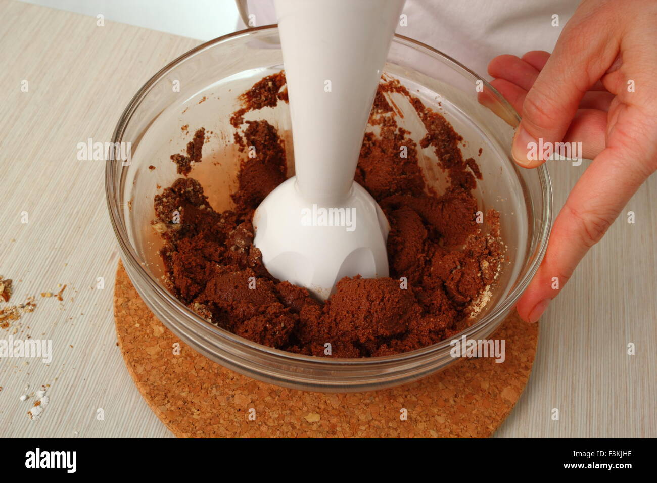 Making filling, process melted chocolate and nut mixture until combined ...
