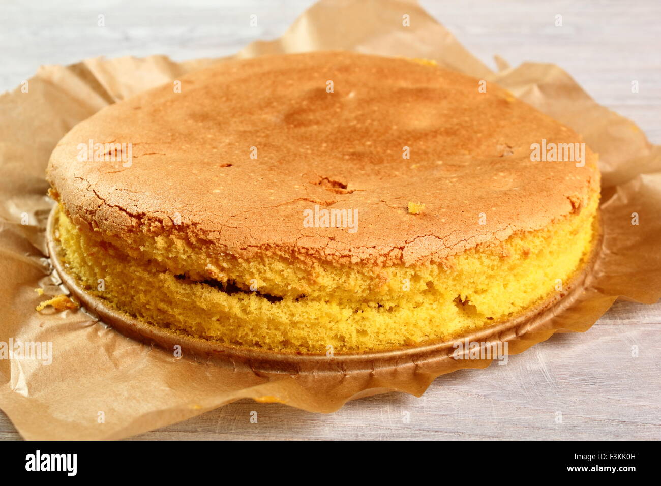 Sponge cake stuffed with chocolate filling Stock Photo - Alamy