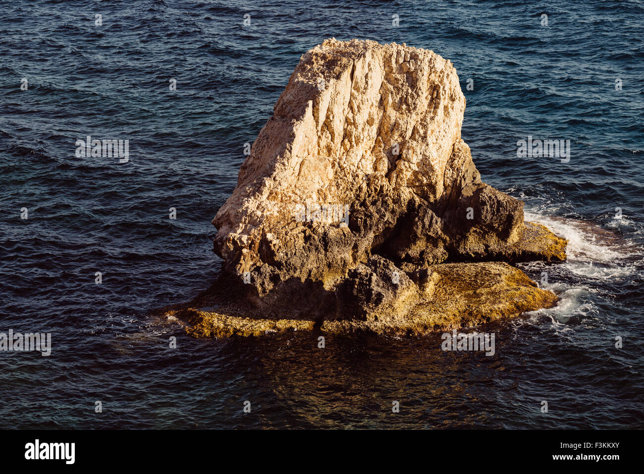 large stone in the water Stock Photo - Alamy