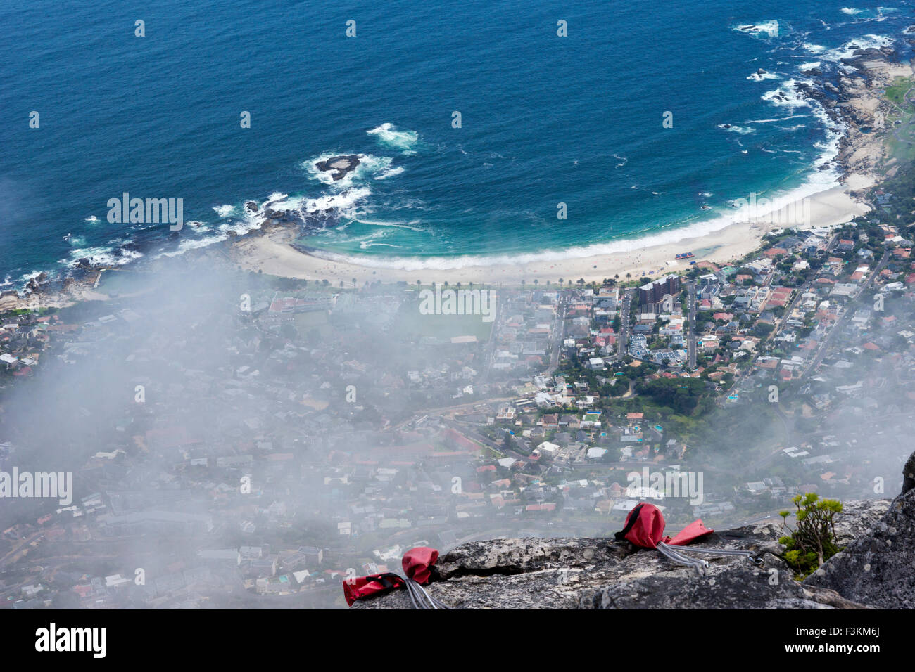 Aerial view of Camp's Bay from cliffside rappelling spot atop Table ...