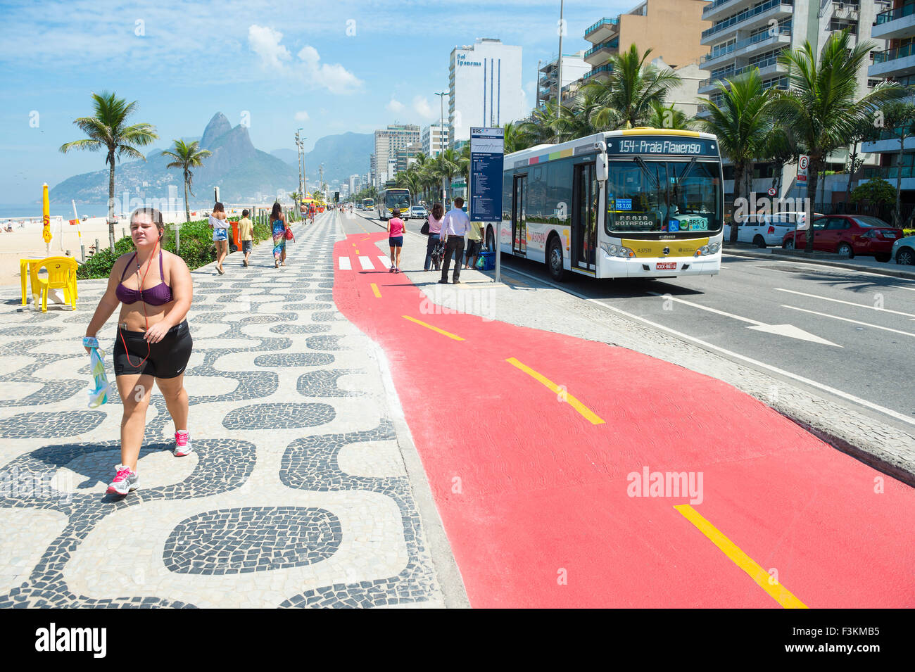 RIO DE JANEIRO, BRAZIL - APRIL 1, 2014: Bus stops along boardwalk bike ...