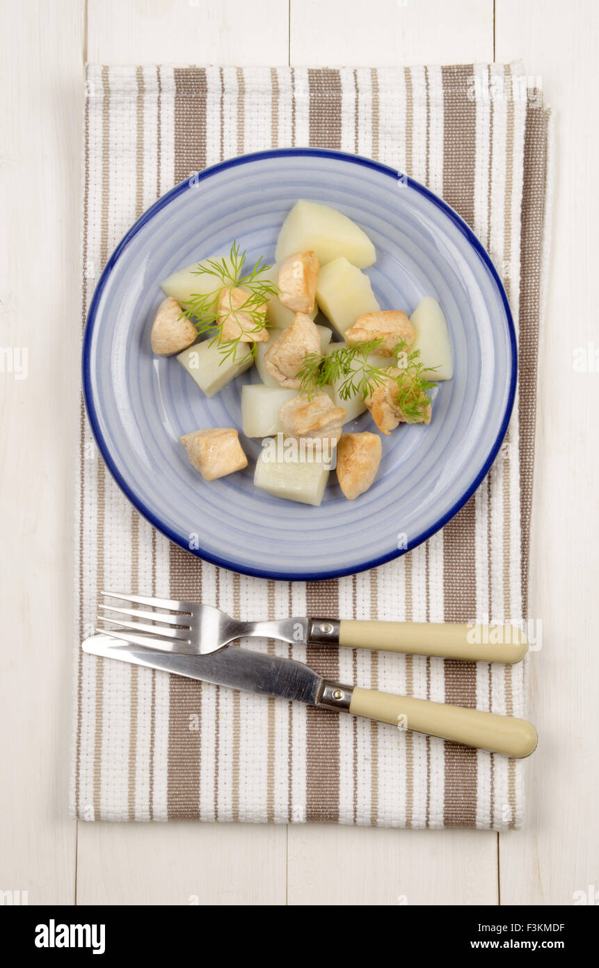 boiled potatoes with grilled chicken fillet cubes and dill Stock Photo ...