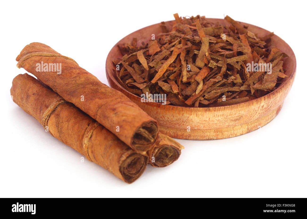 Dry tobacco leaves over white background Stock Photo - Alamy