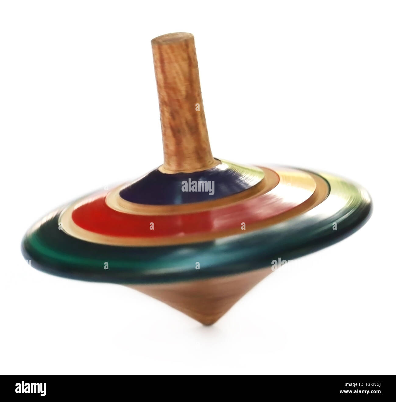 Decorative spinning top over white background Stock Photo - Alamy