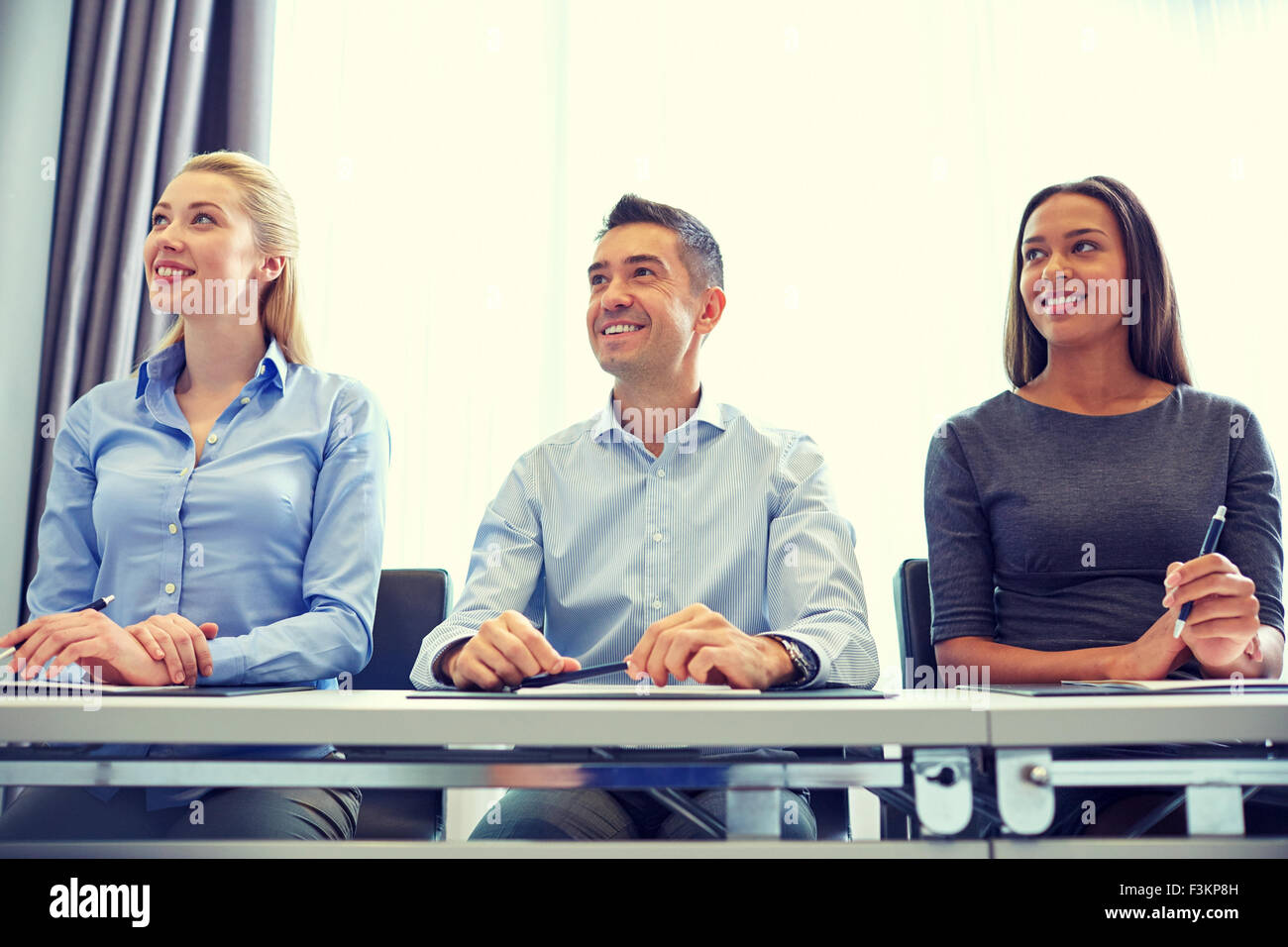 smiling business people meeting in office Stock Photo - Alamy