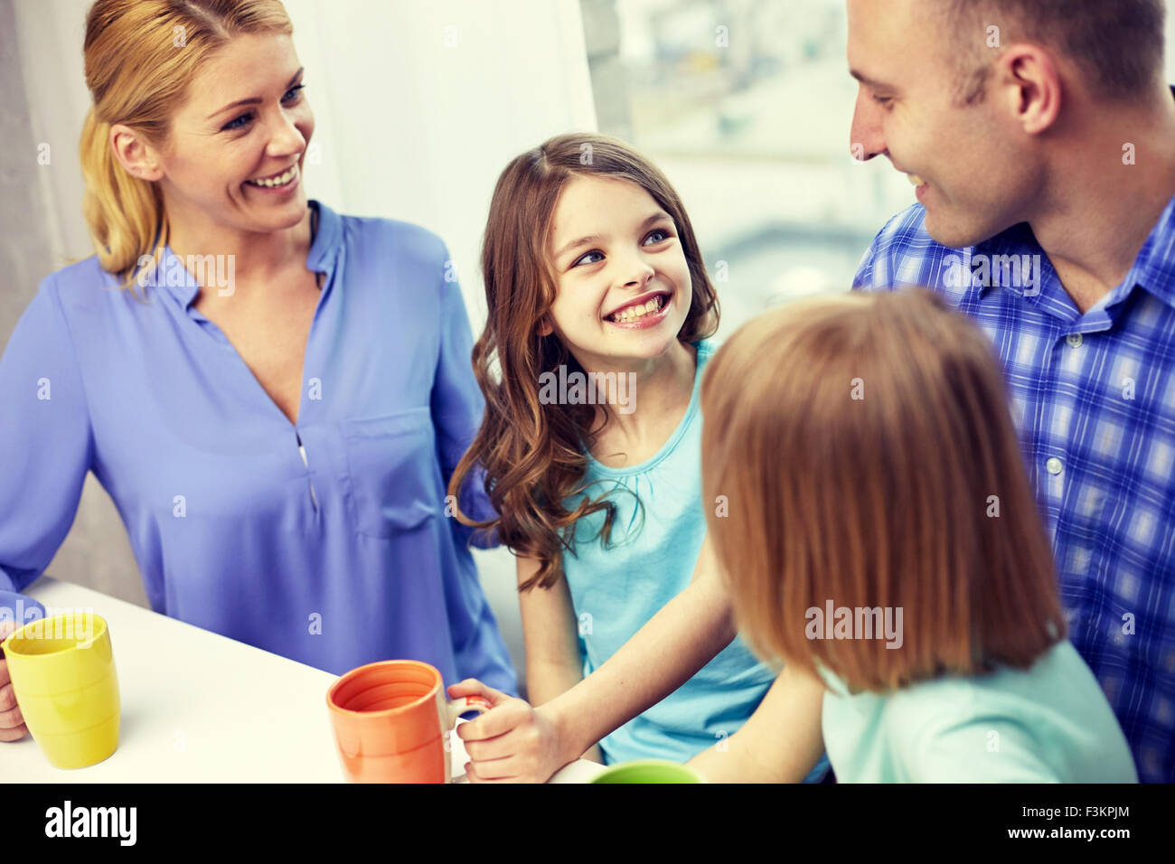 Parents drinking with children home hi-res stock photography and images ...