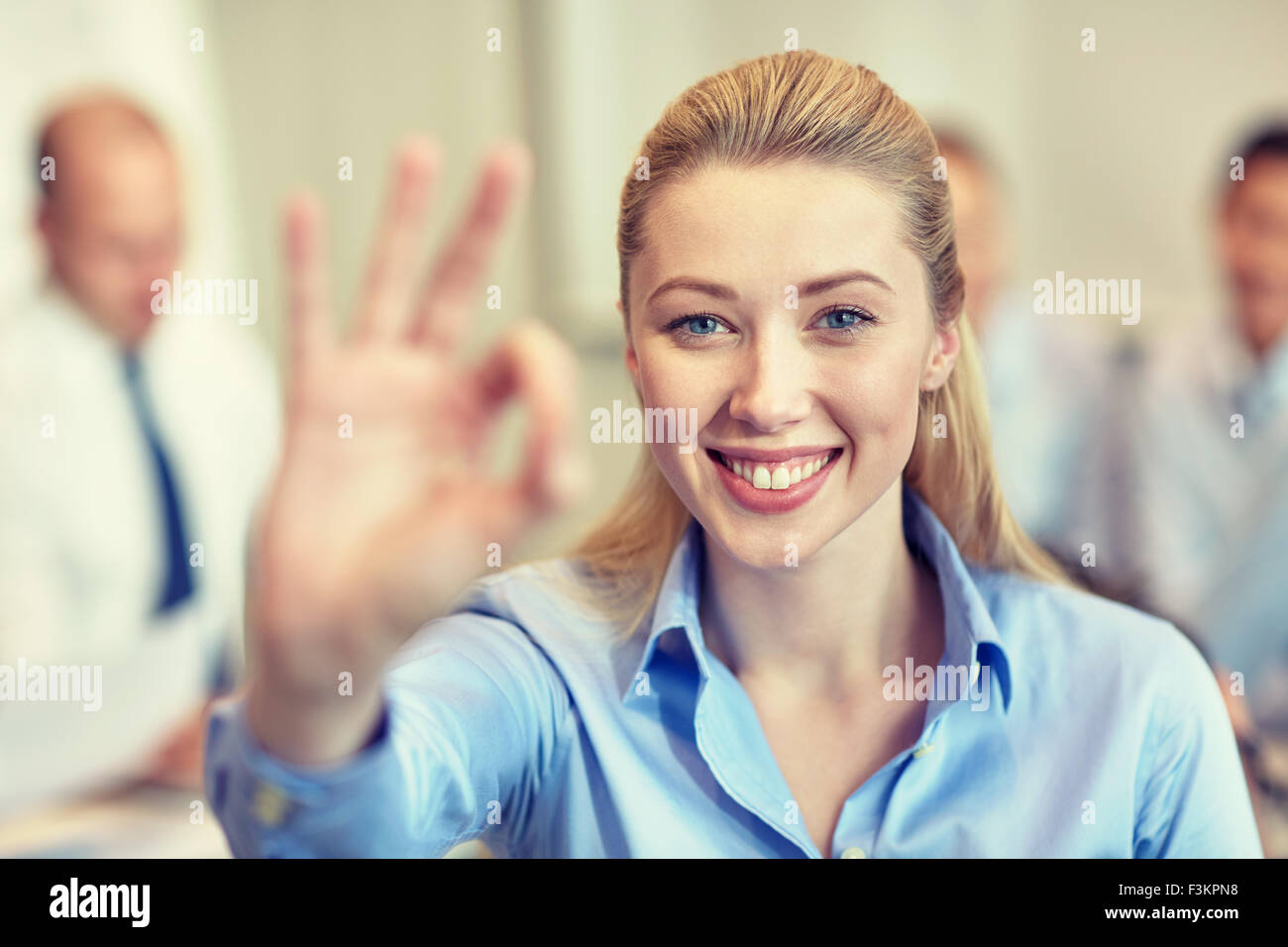 group of smiling businesspeople meeting in office Stock Photo - Alamy