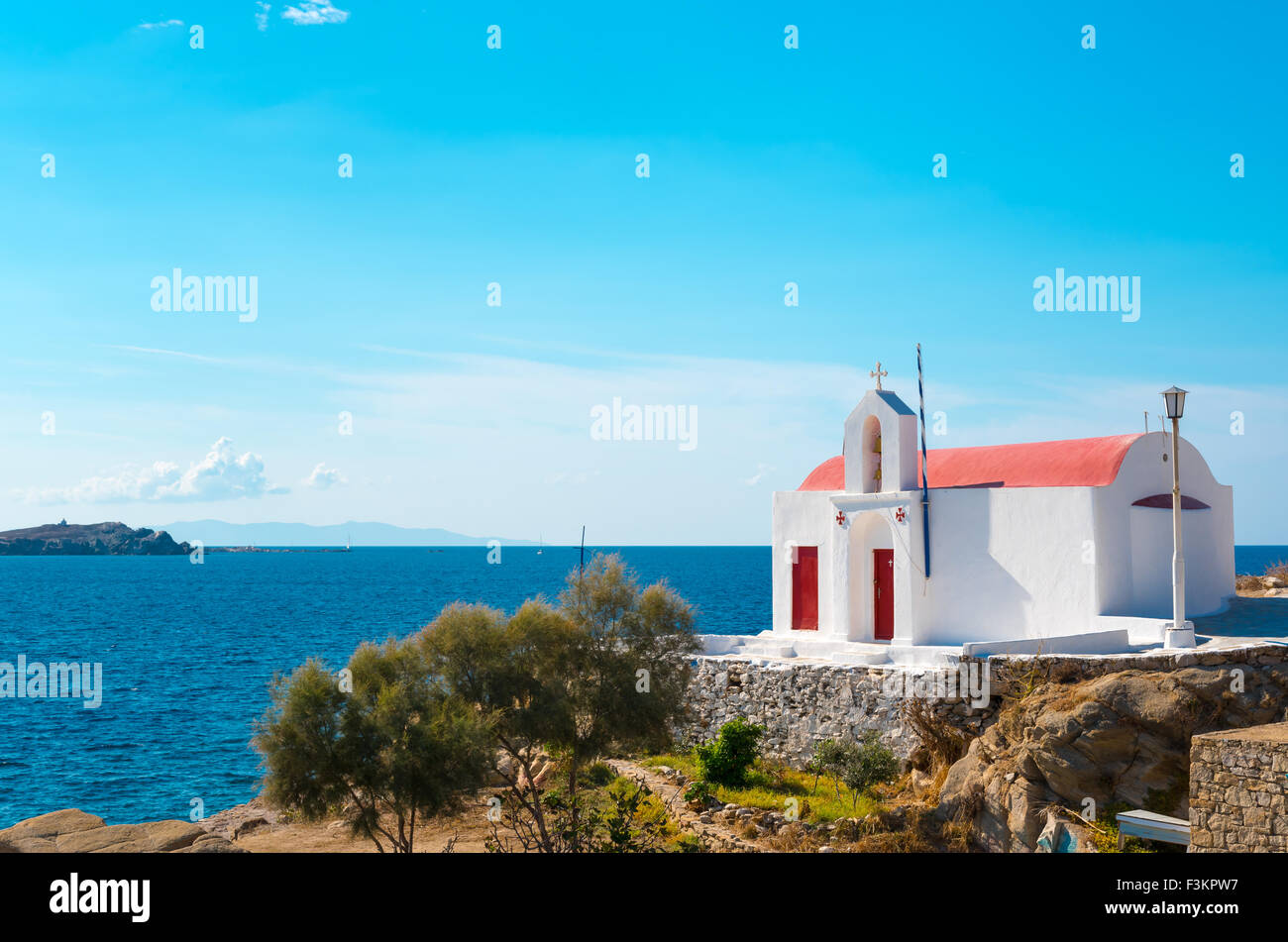 small greek orthodox chapel at the seaside in mykonos Stock Photo - Alamy